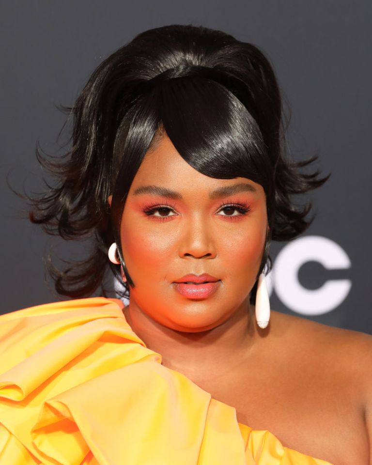 Lizzo Ditches Extensions For A Silk Press, Shows Off Her Thick Natural Hair