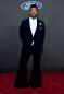Deon Cole Responds To Hateful Backlash Over His Gucci Bell Bottoms