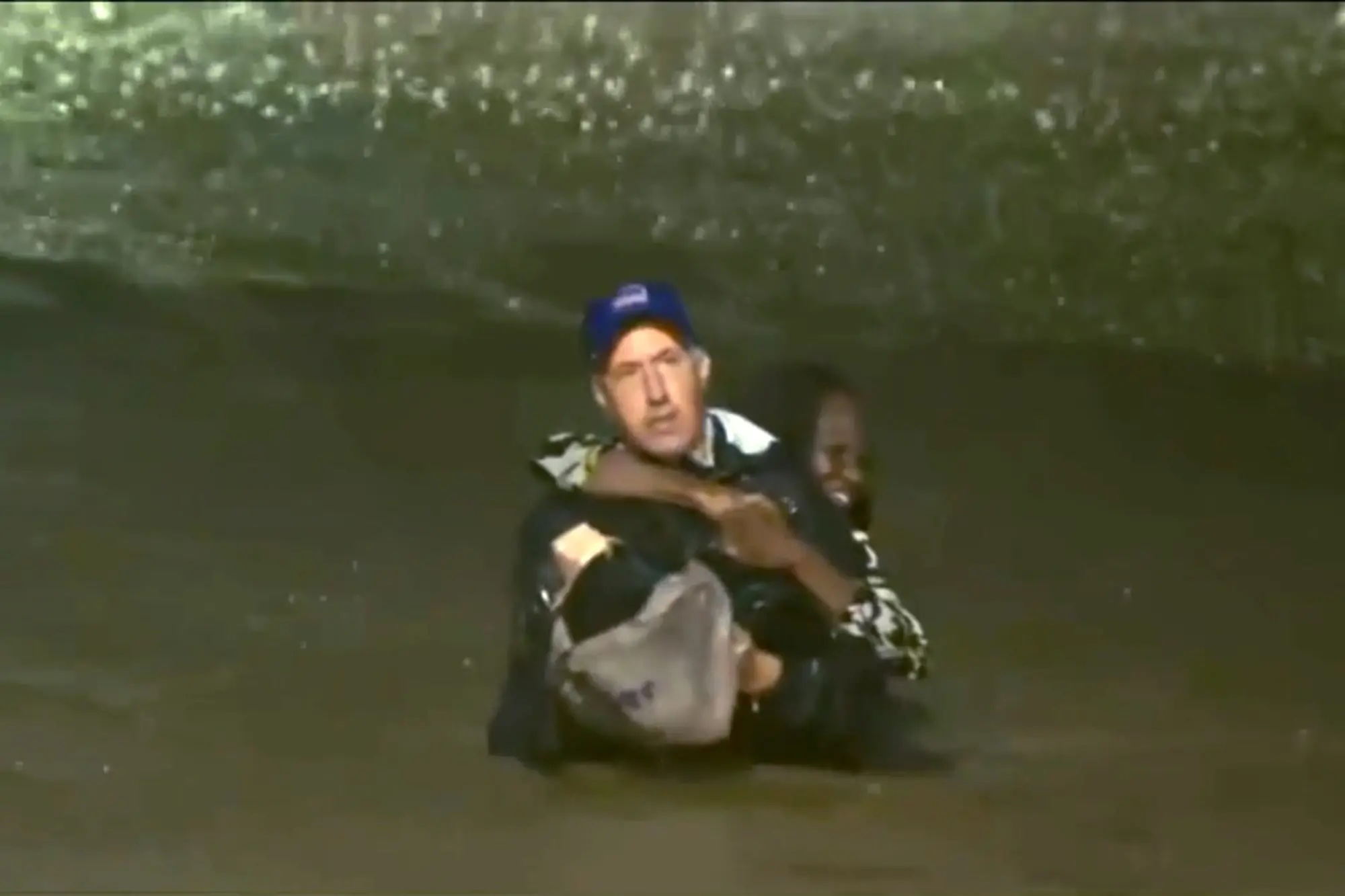 Courageous Meteorologist Saves Woman in Sinking Vehicle