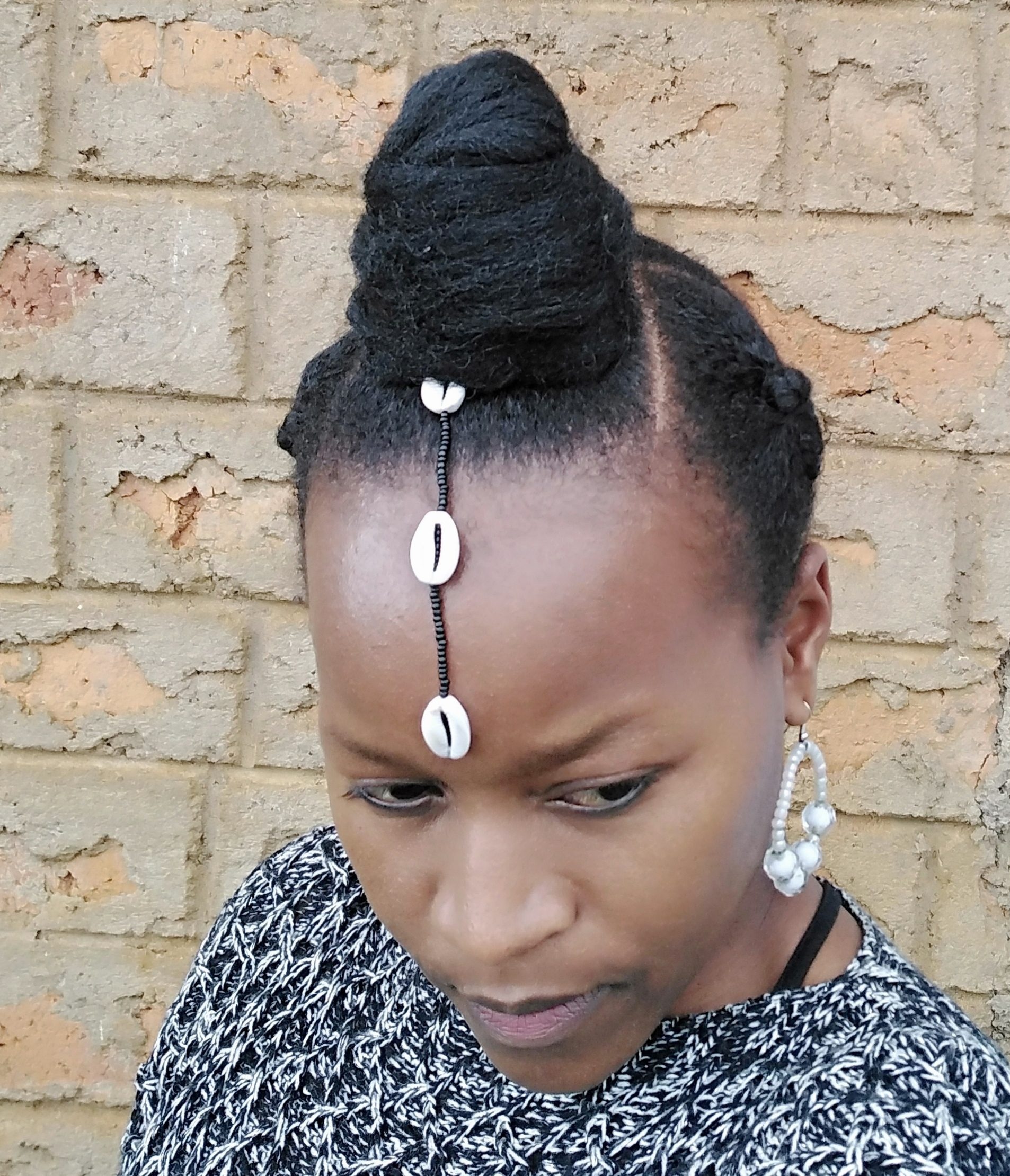 The History And Spirituality Behind Cowrie Shells